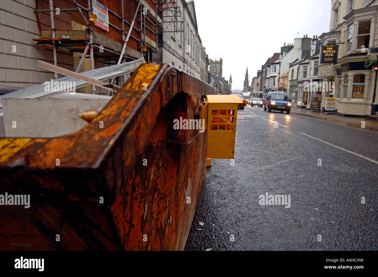 Skip with rubble on the road hi-res stock photography and images - Alamy