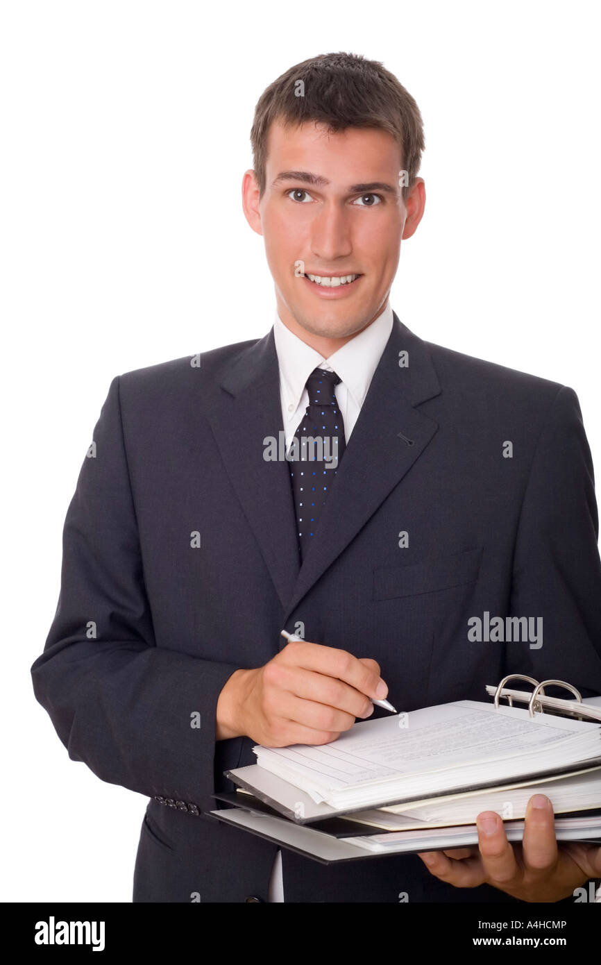 Young business man writing and smiling Stock Photo - Alamy