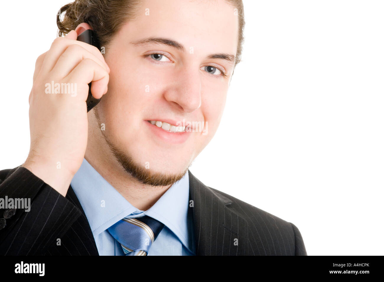 Young manager uses his mobile phone Stock Photo - Alamy