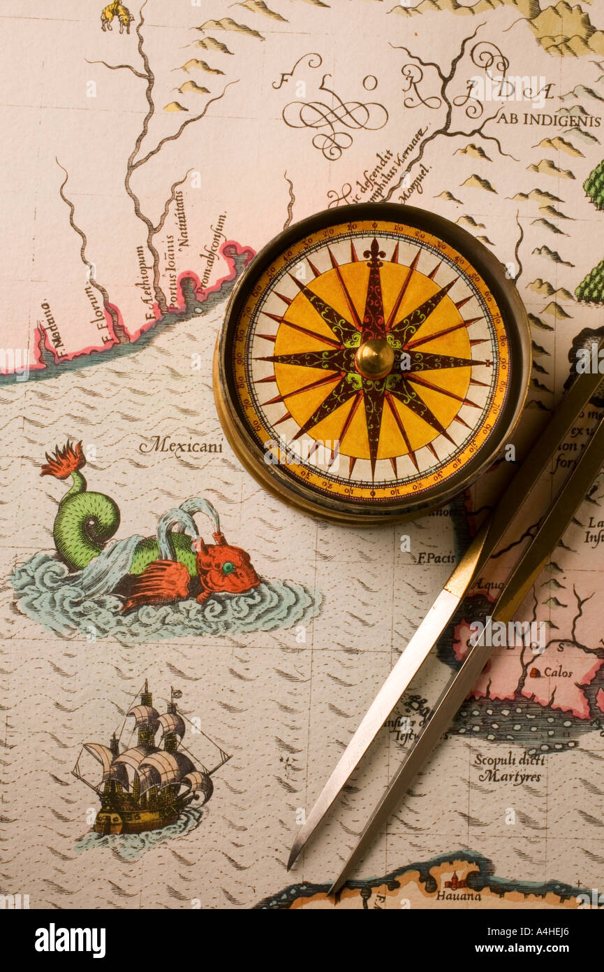 Compass on old map Stock Photo - Alamy