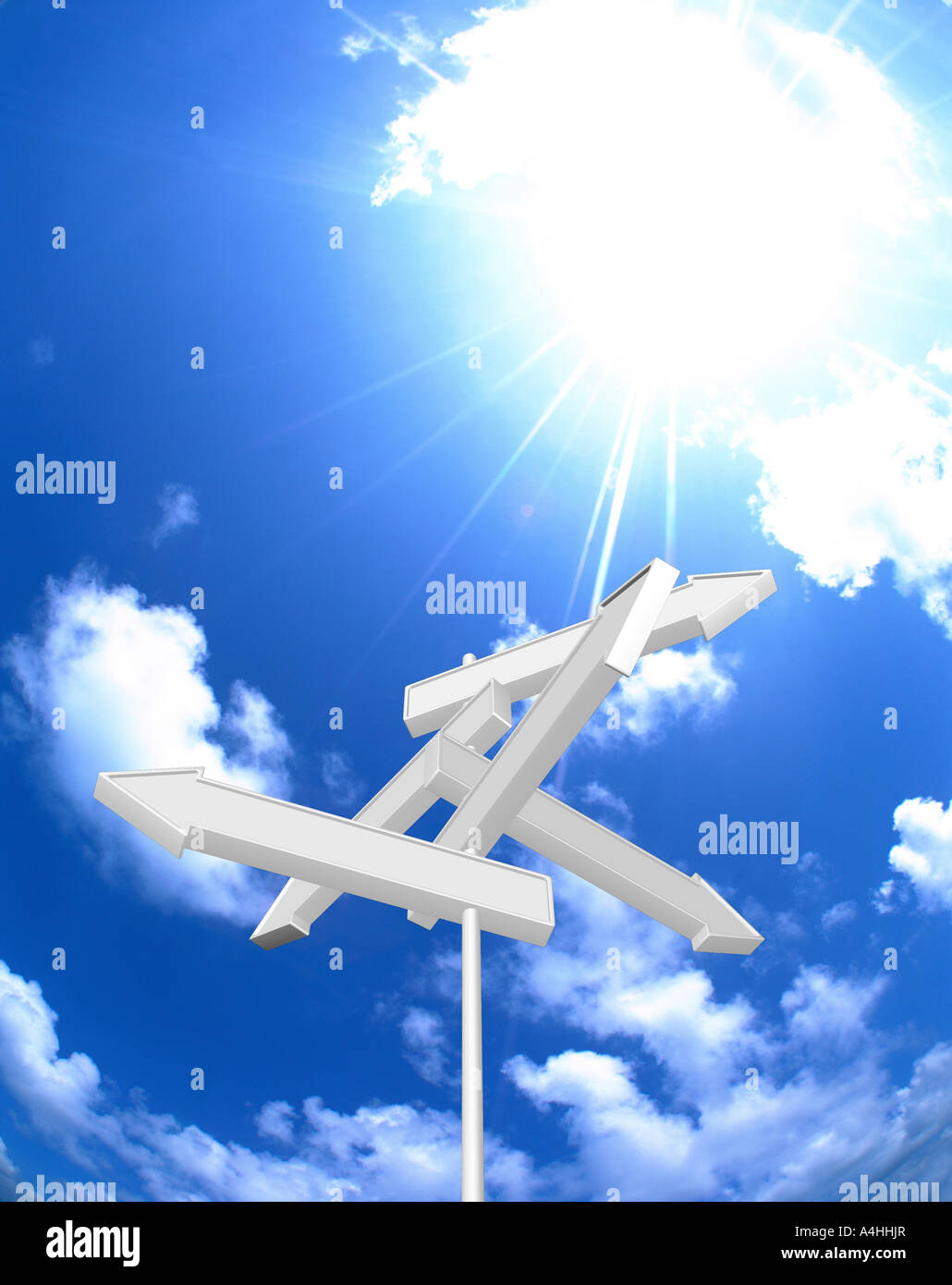 Arrows against a sky with the bright sun Stock Photo - Alamy