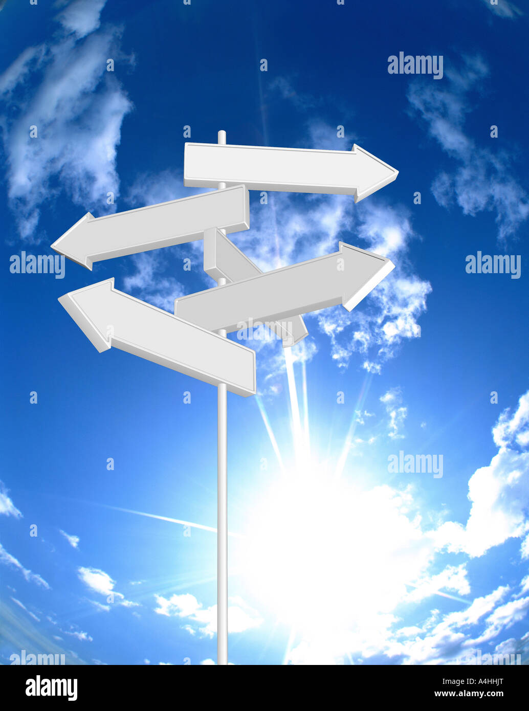 Arrows against a sky with the bright sun Stock Photo - Alamy