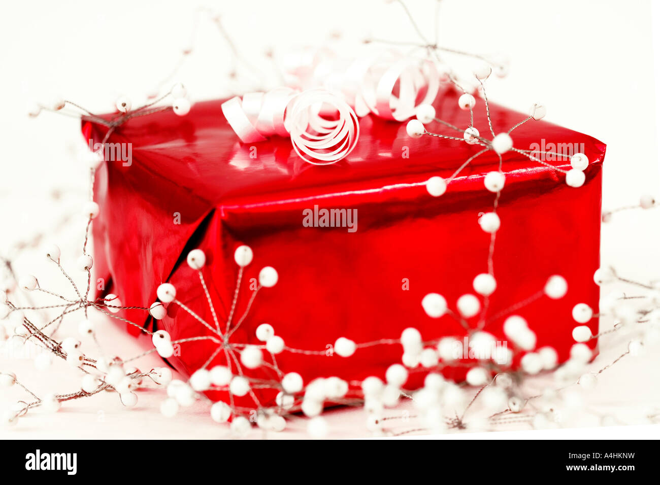Gift wrapped christmas parcel Stock Photo - Alamy