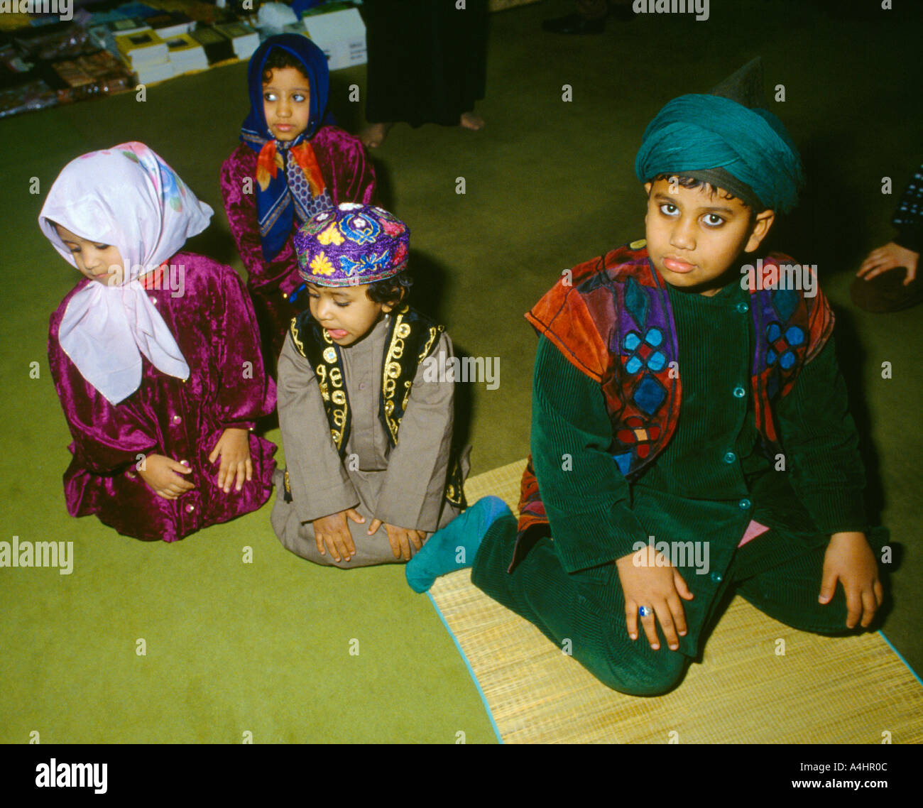 Peckham Mosque Children Praying On Ramadan Family Boy in front Girls ...