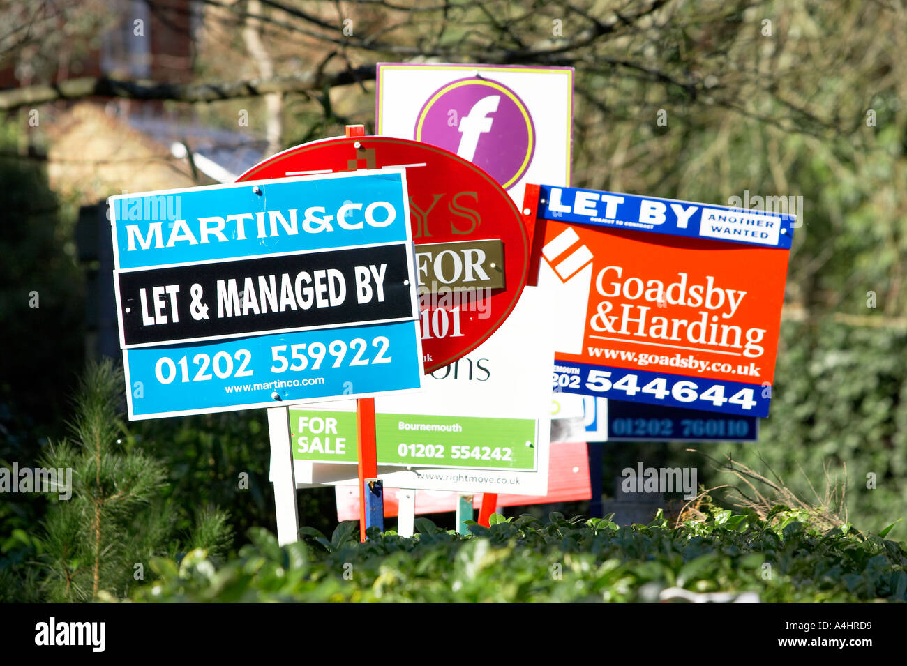Estate Agents sales boards Stock Photo - Alamy