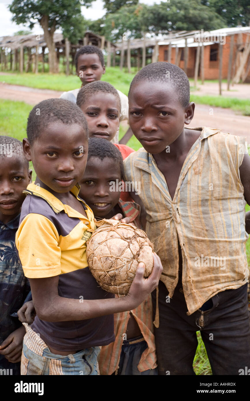 Boys with their football made from old plastic bags bound up with ...