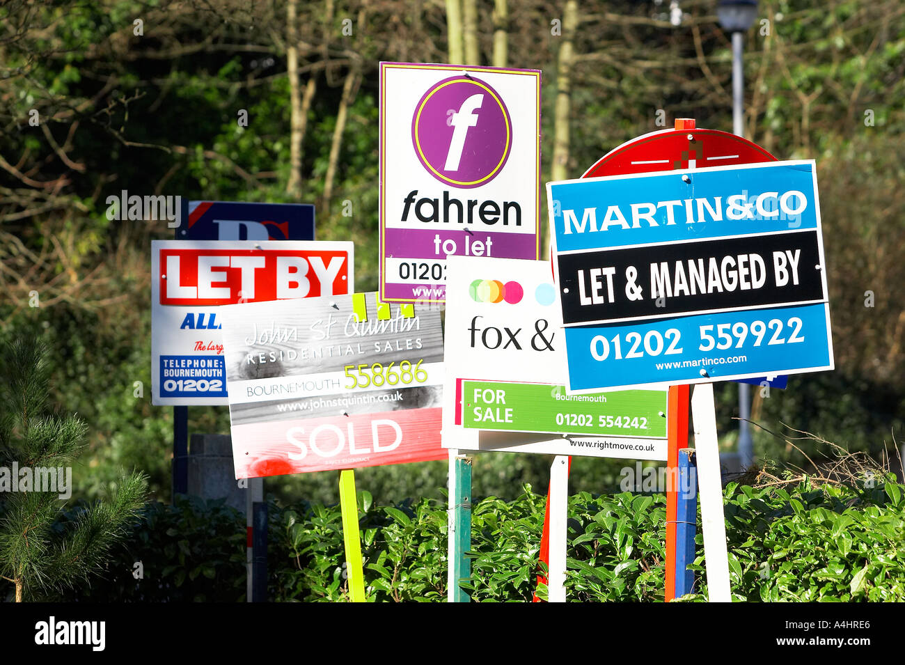 Estate Agents sales boards Stock Photo - Alamy