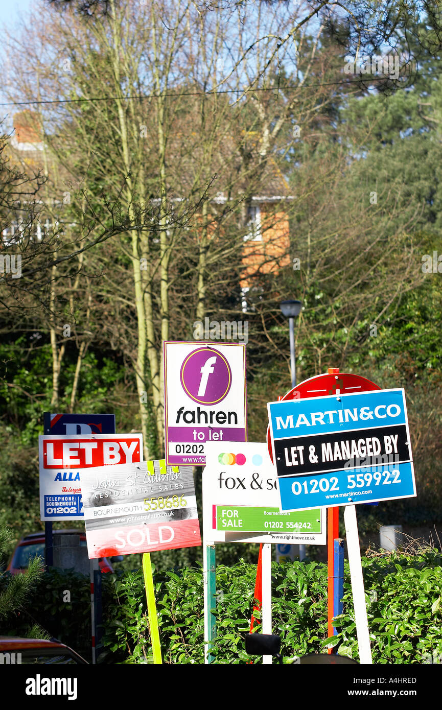 Estate Agents sales boards Stock Photo - Alamy