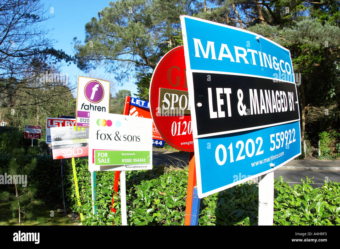 Estate Agents sales boards Stock Photo - Alamy