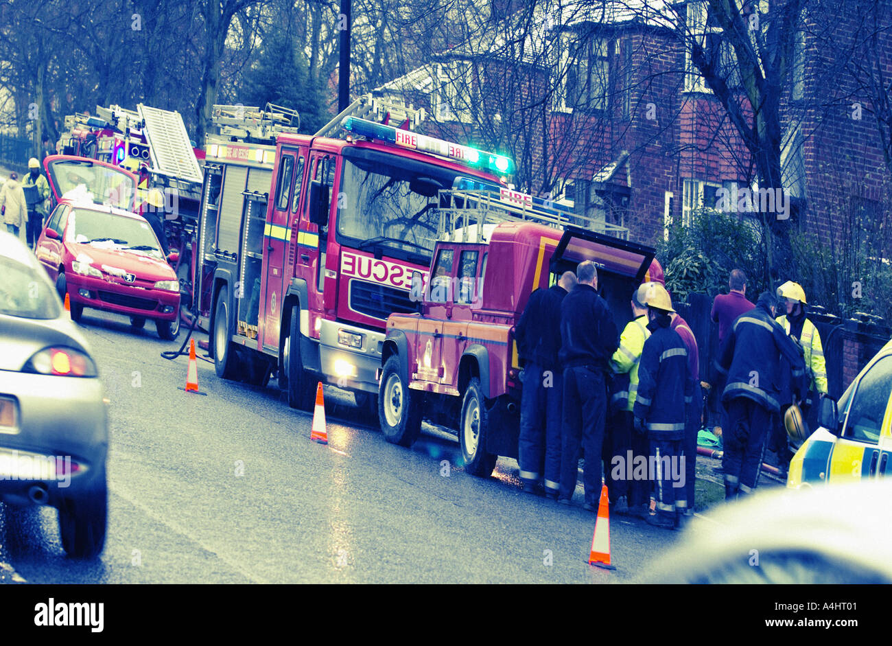 Fire Engine attending incident in busy suburban UK street Stock Photo ...