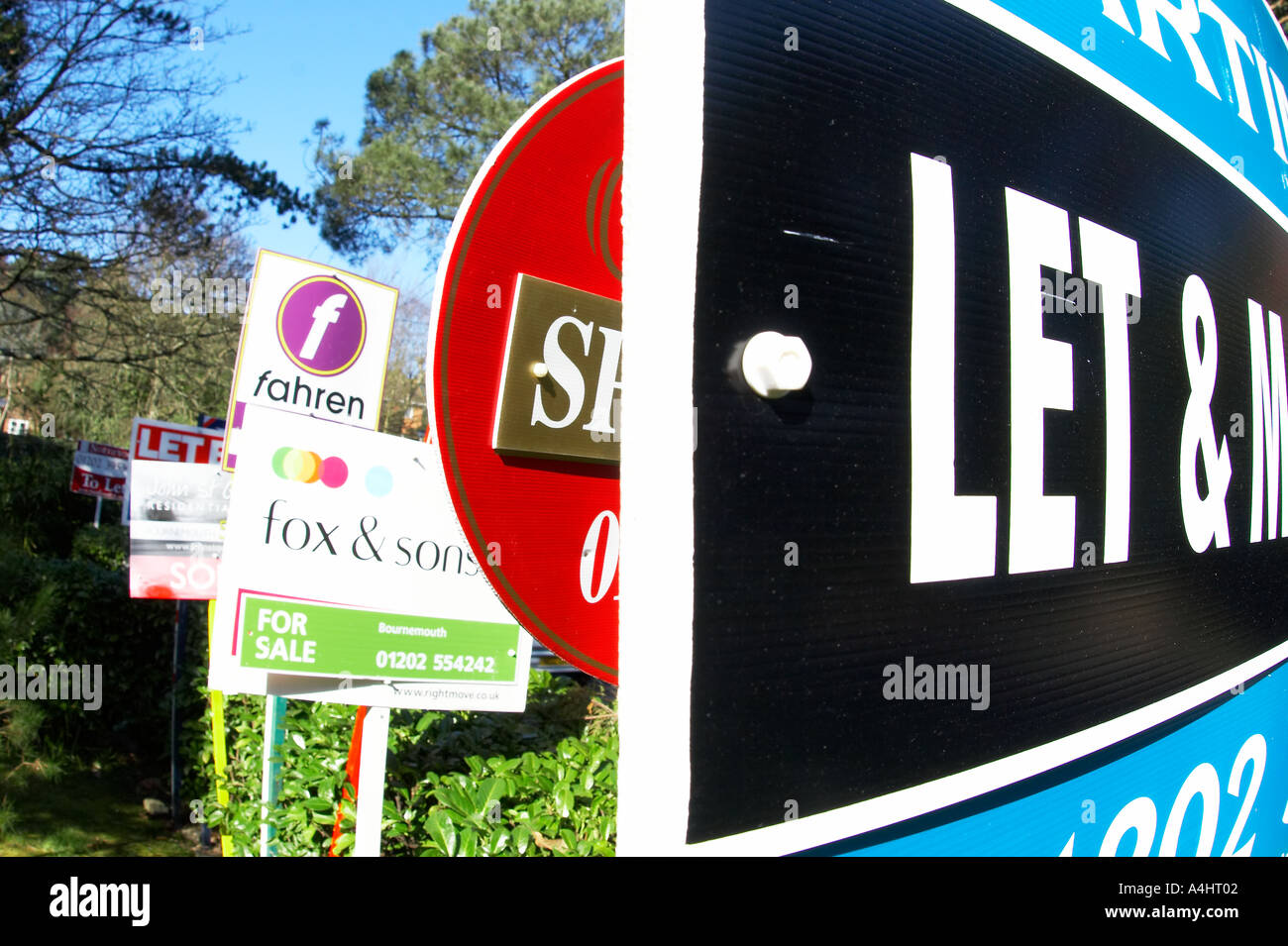 Estate Agents sales boards Stock Photo - Alamy
