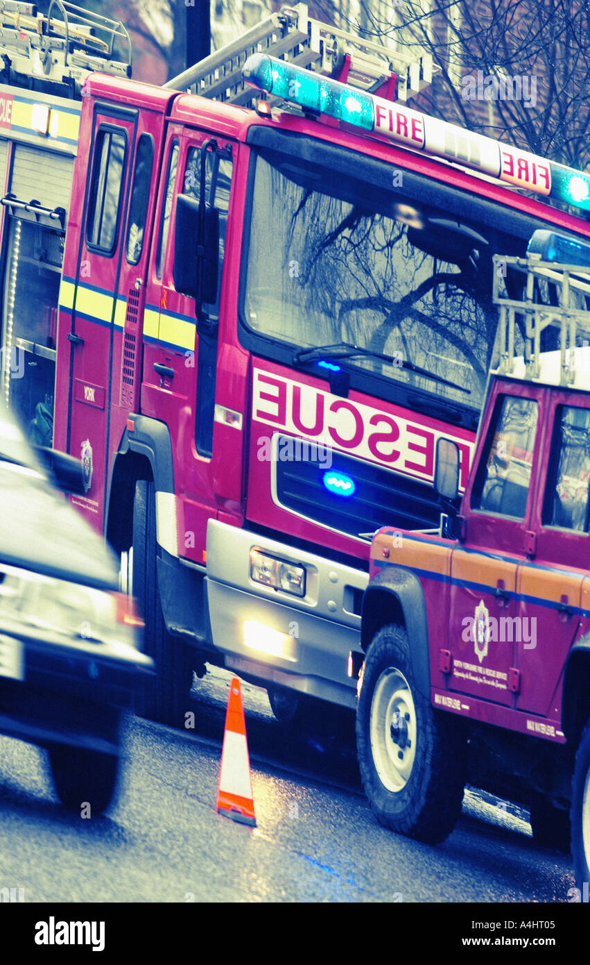 Fire Engine attending incident in busy suburban UK street Stock Photo ...