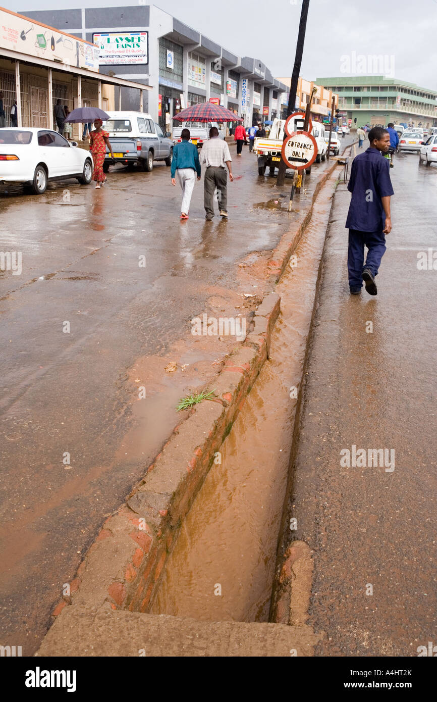 Gutter flowing fast after heavy hi-res stock photography and images - Alamy