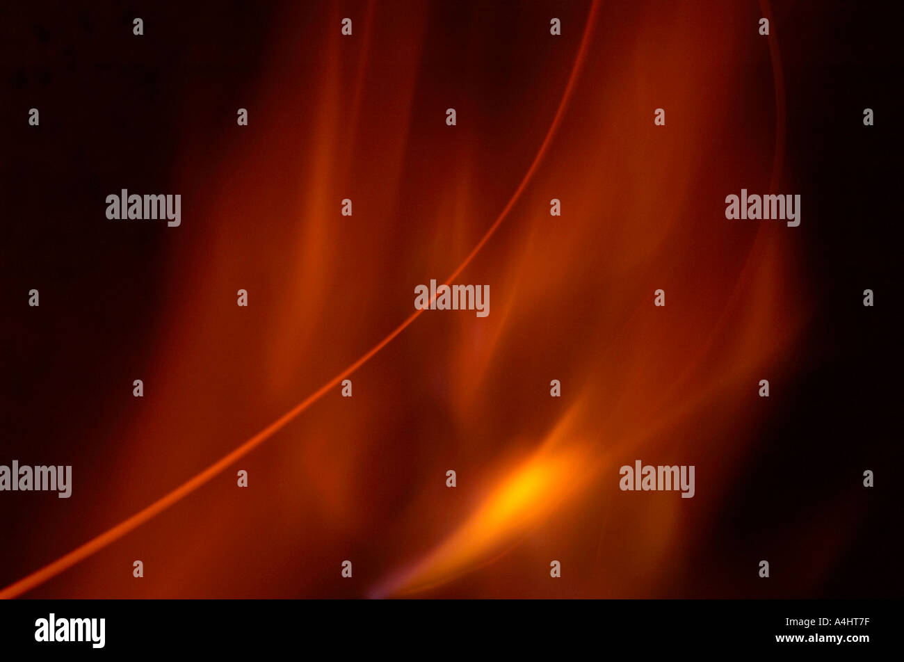 Detail of beautiful curling flames in a log fire Stock Photo - Alamy