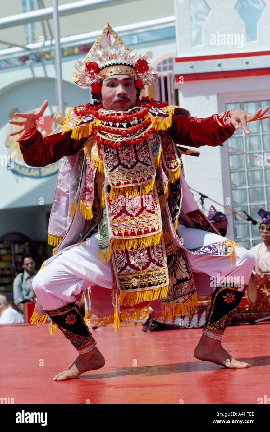 A Performer from Indonesia performing a Traditional Dance on Stage ...
