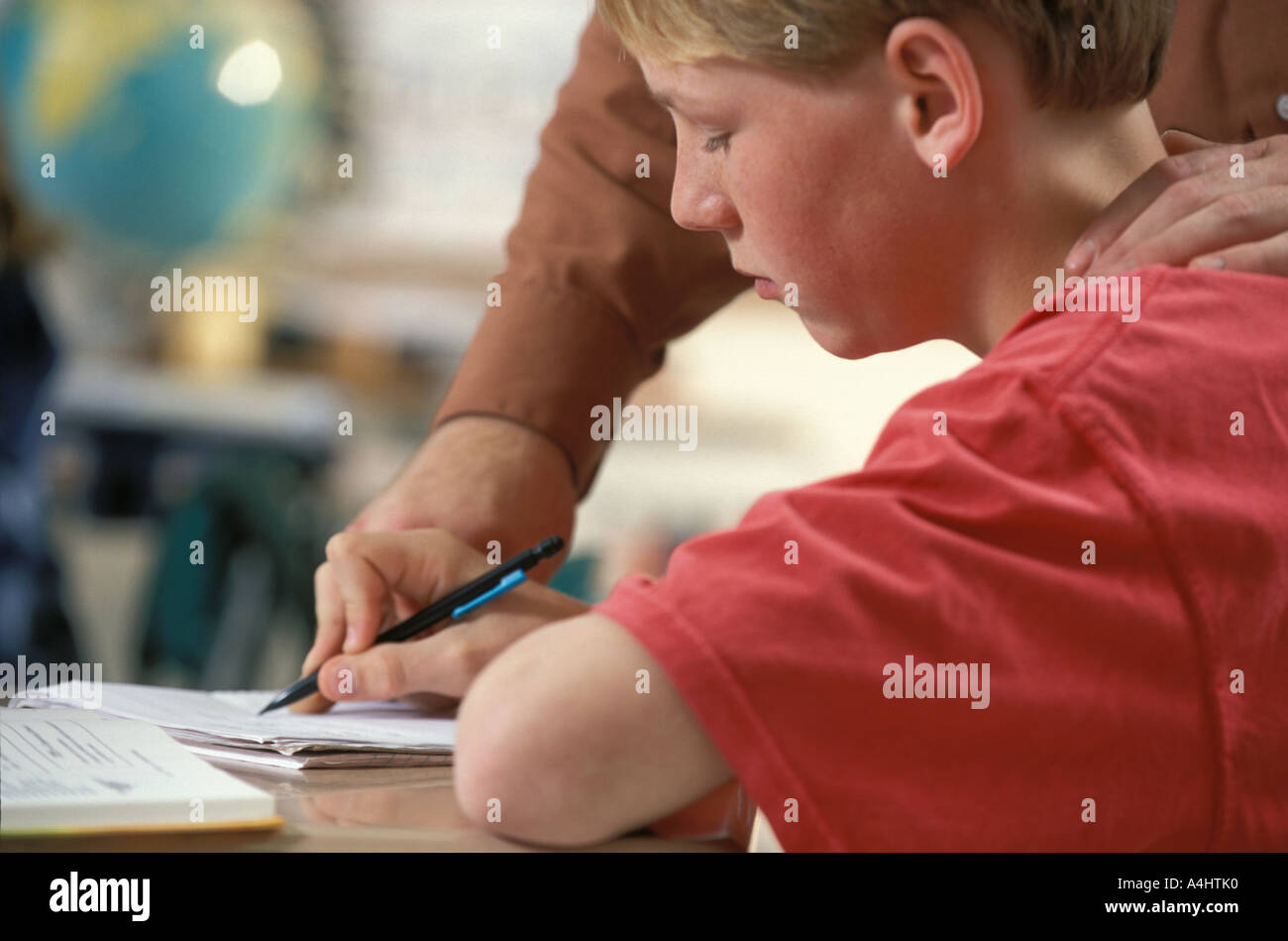 Concerned teacher with student hi-res stock photography and images - Alamy