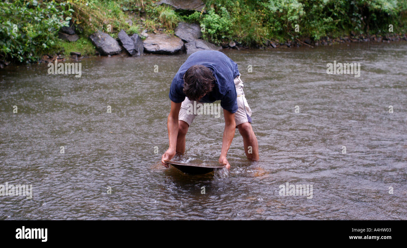 gold panning in a river in the dordogne france Stock Photo - Alamy