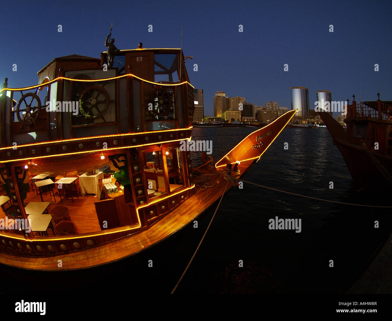 Dubai Creek Twin Towers traditional wooden ship dhow Stock Photo - Alamy