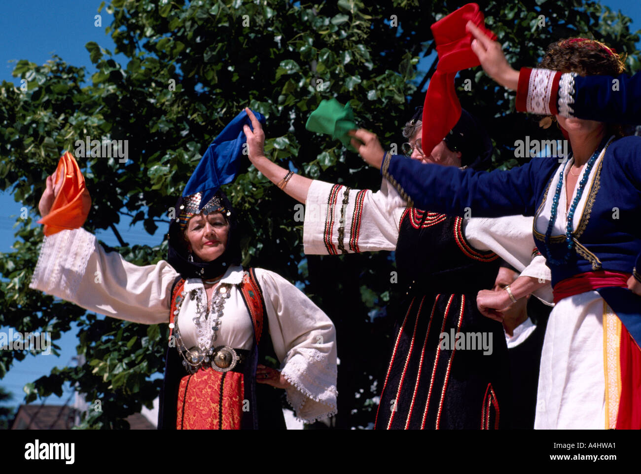 Greek Women in Ethnic Dress perform a Traditional Greek Dance in the ...