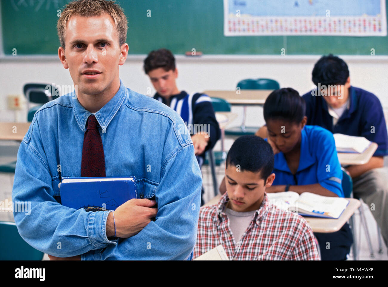 Portrait Caucasian male high school teacher in class Stock Photo - Alamy