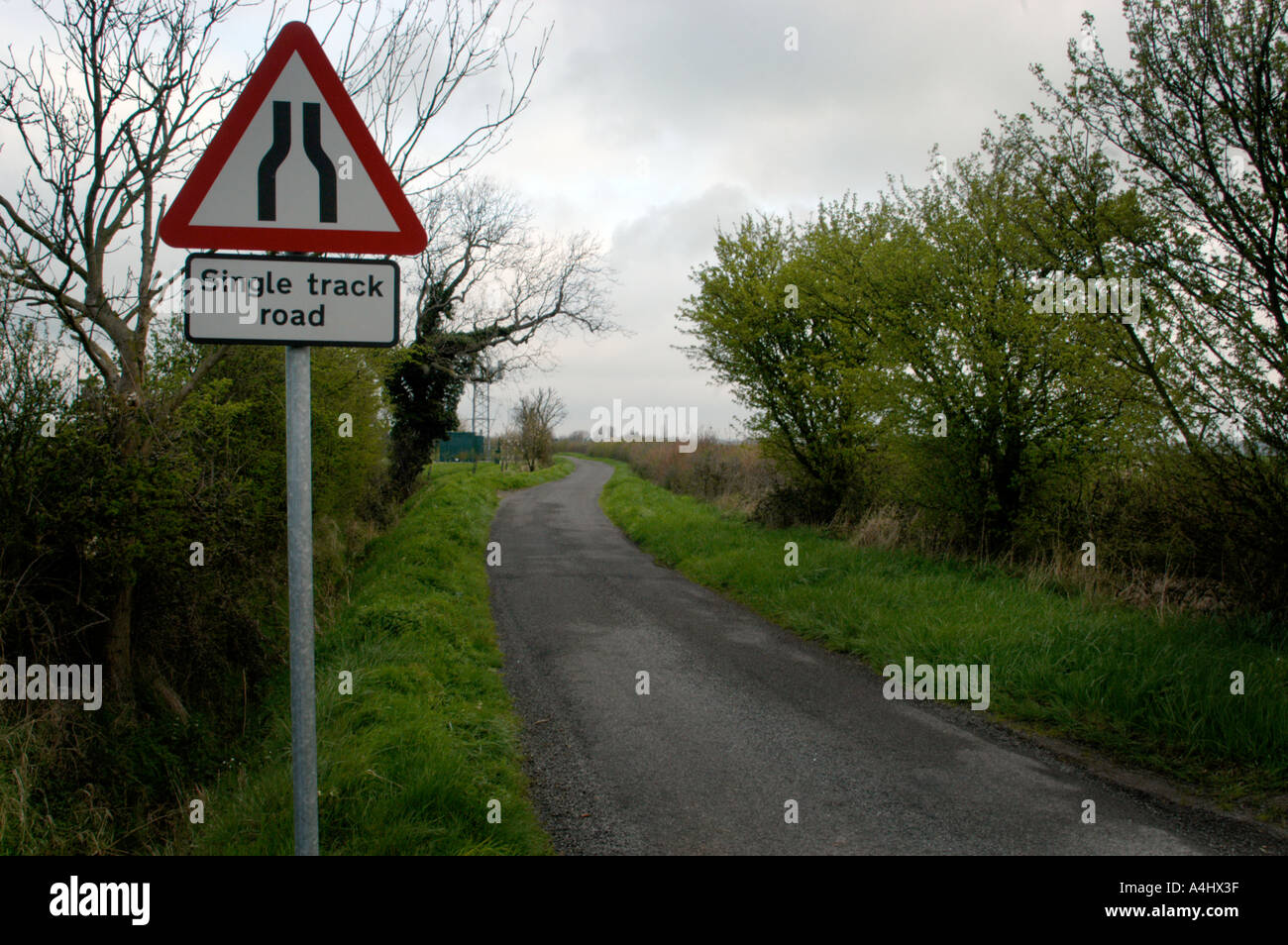 single lane track sign on country road Stock Photo - Alamy