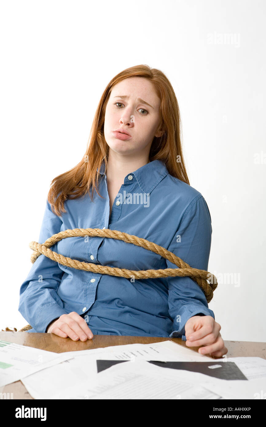 Frustrated woman at her desk Stock Photo - Alamy