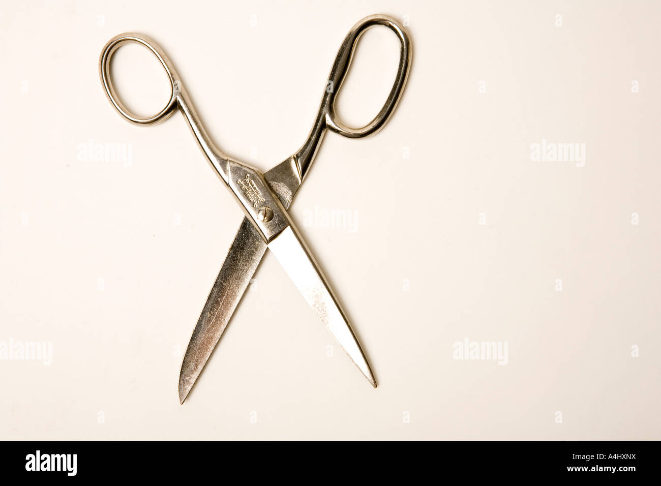 Pair of scissors on white background Stock Photo - Alamy
