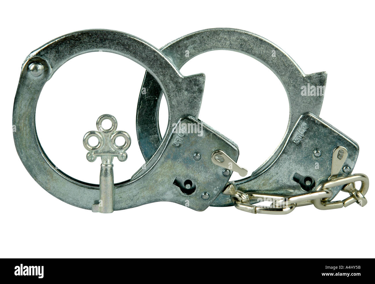 Handcuffs with key Stock Photo - Alamy