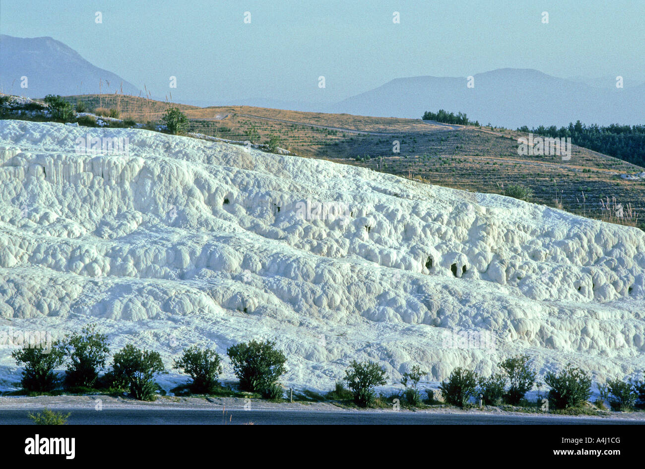 Calcium Deposits Encroaching on Land, Pamukkale, Turkey Stock Photo - Alamy