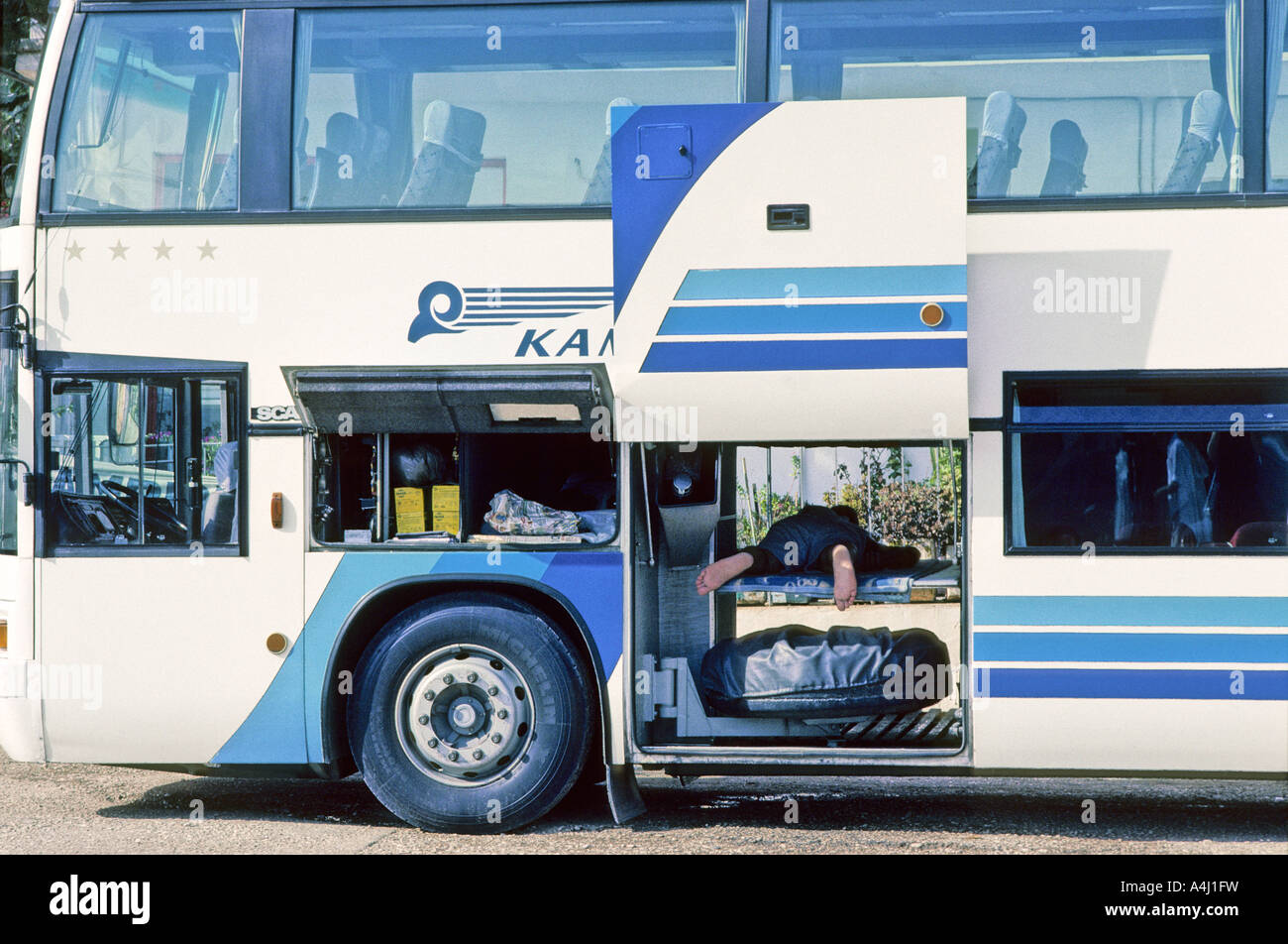 Exhausted Bus Driver Sleeping in Empty Bus, Turkey Stock Photo - Alamy