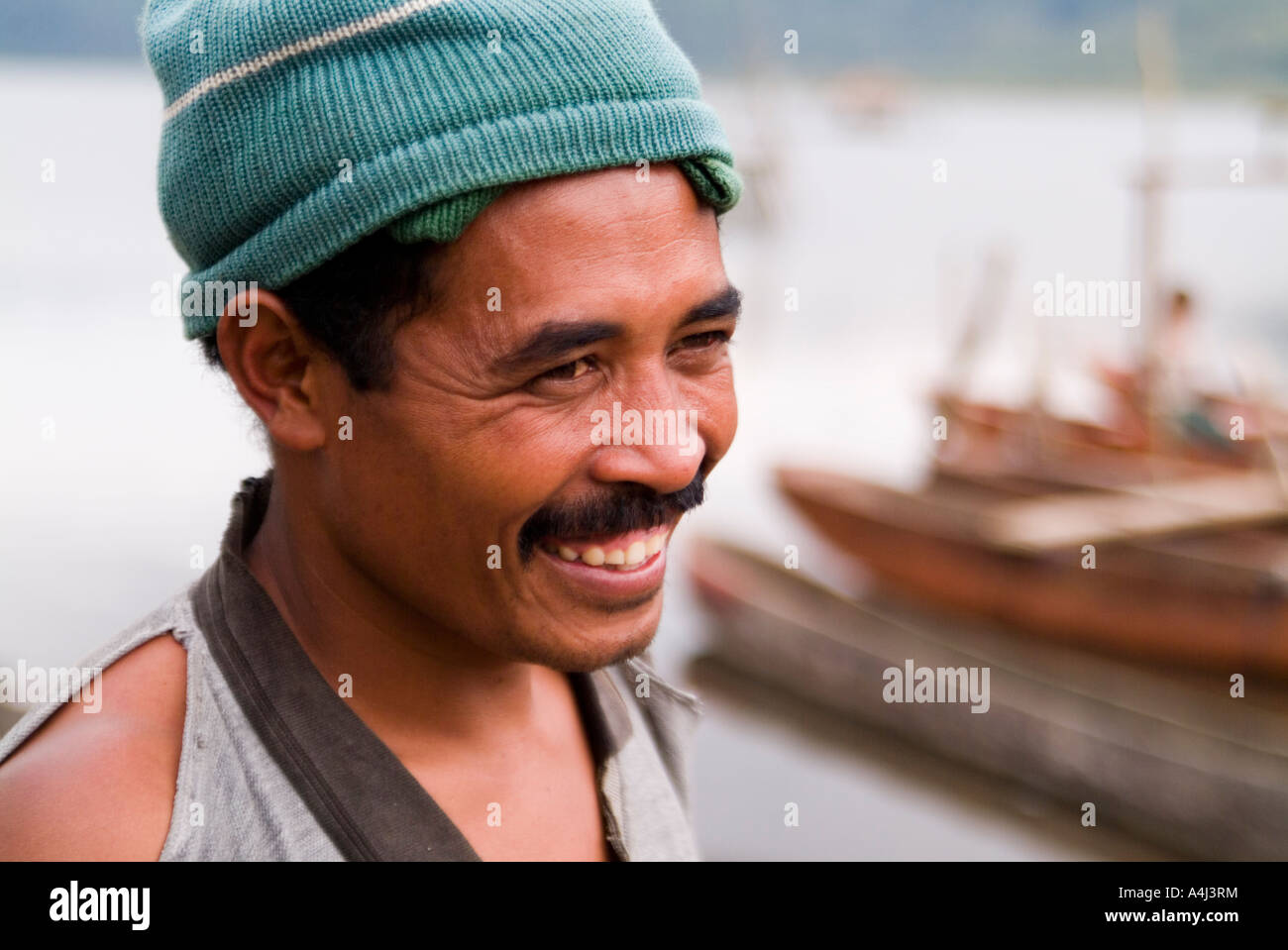 Smiling fisherman in Bali Stock Photo - Alamy