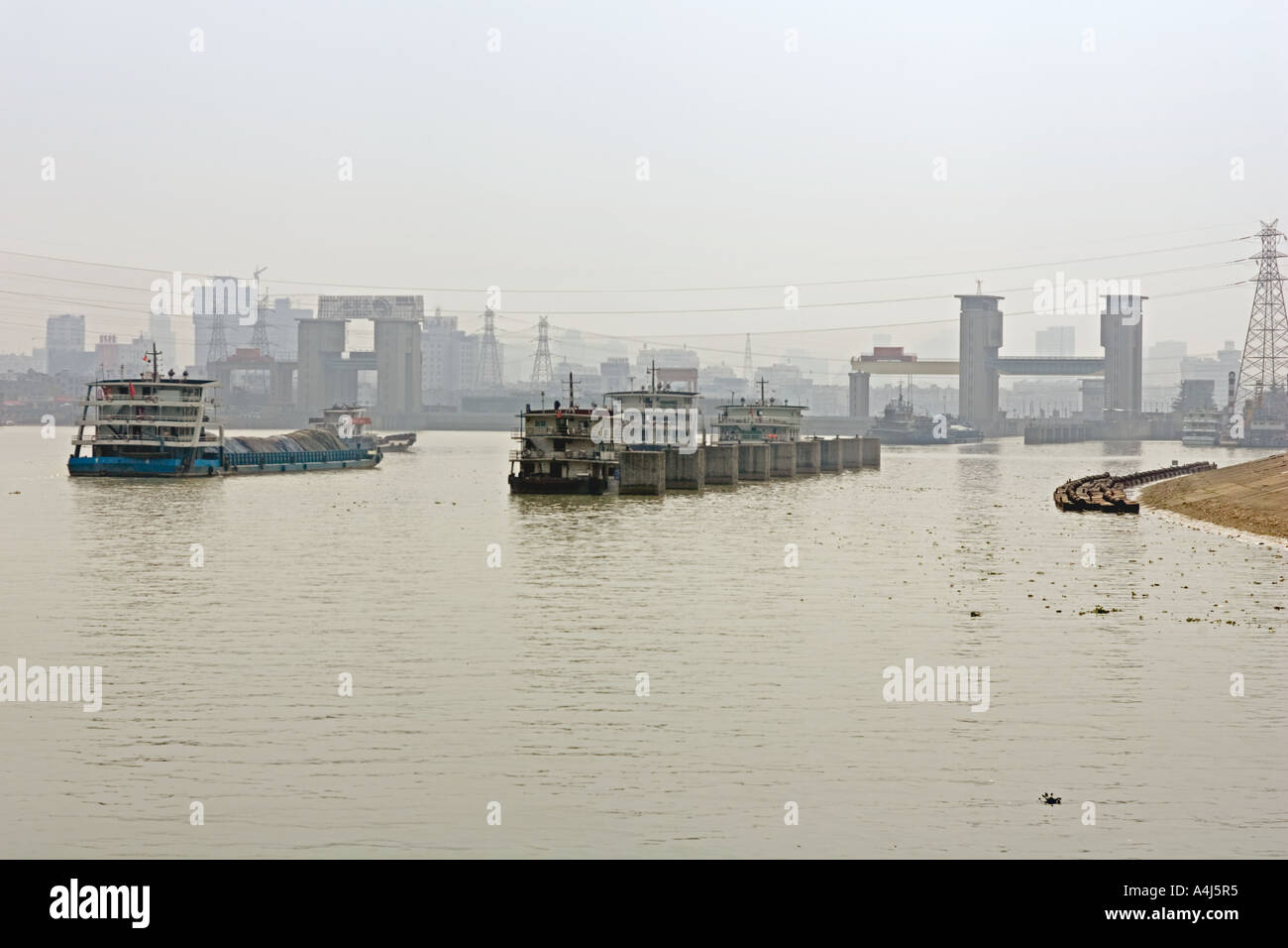 CHINA YICHANG Barges and ferries wait in the locks at the Gezhouba Dam ...