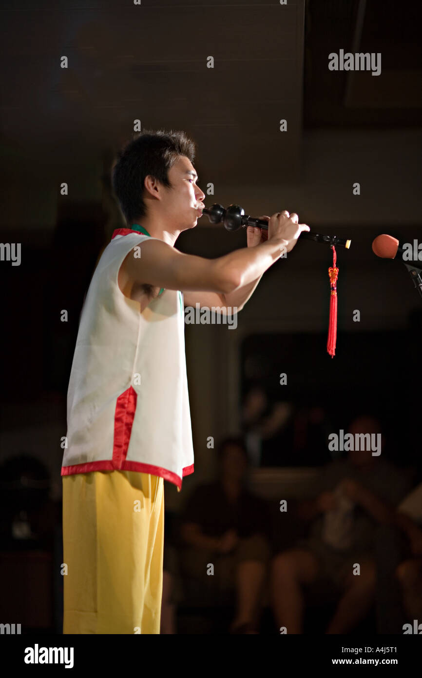 Young chinese student plays hi-res stock photography and images - Alamy