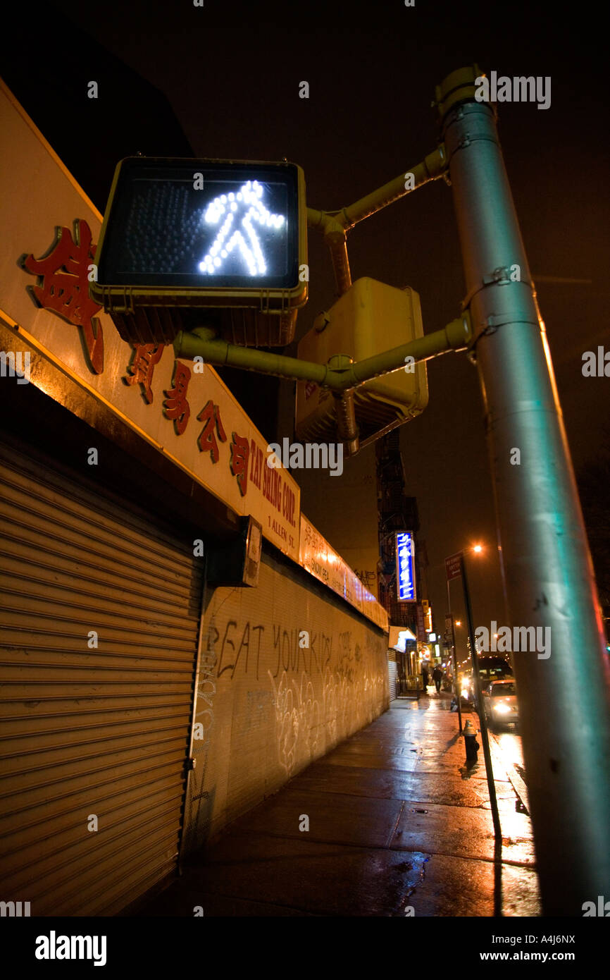'Walk' sign on a rainy night Stock Photo - Alamy