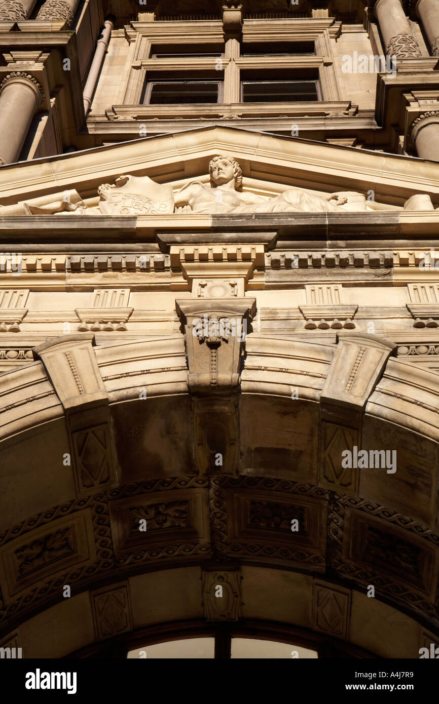 Detail of front of building in central Edinburgh showing carved stone ...