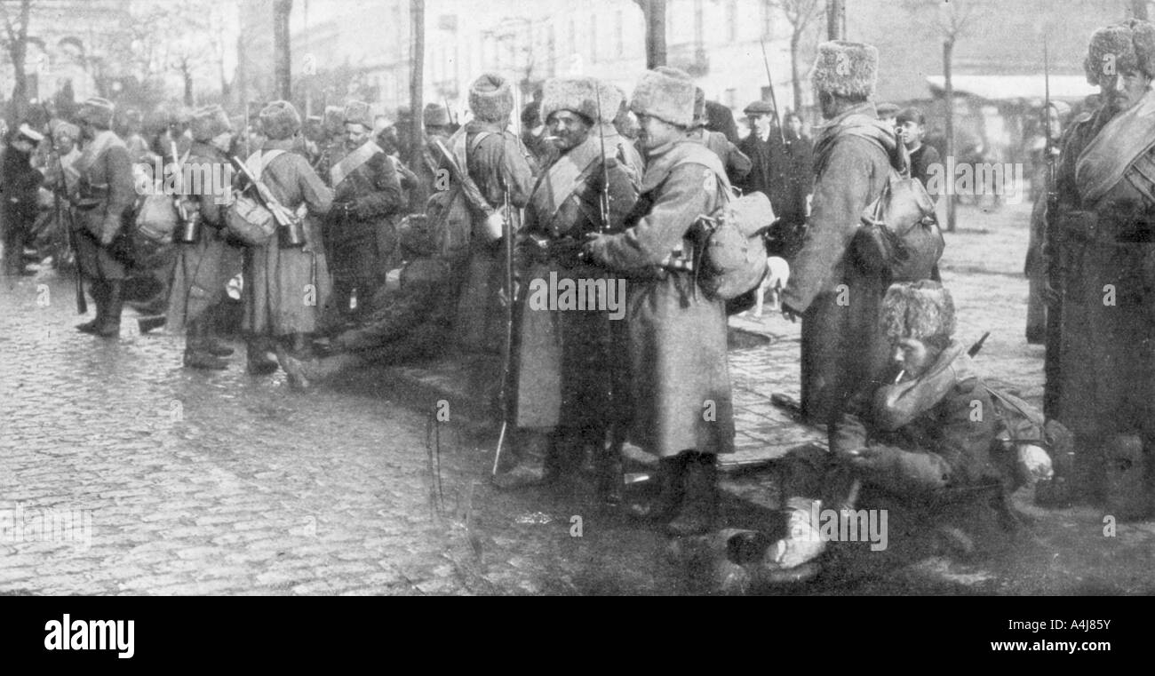 Russian Siberian infantry troops in Warsaw, Poland, 1914. Artist ...