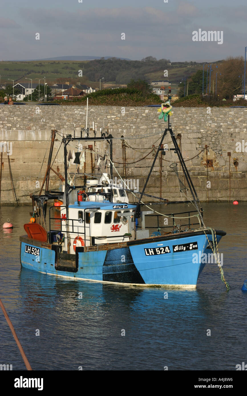 Blue Fishing Boat Stock Photo - Alamy