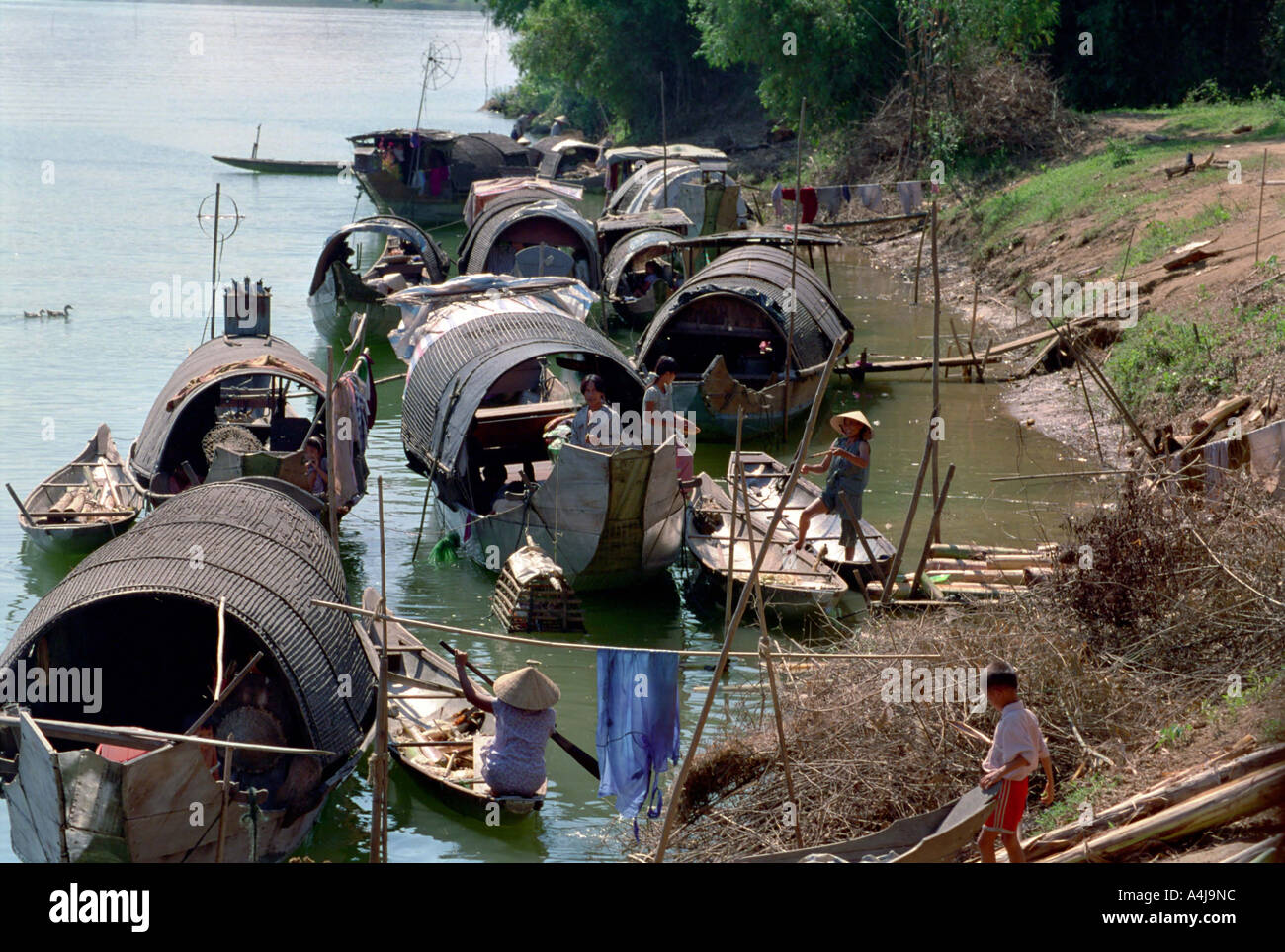 Boat people Hue Vietnam Stock Photo - Alamy