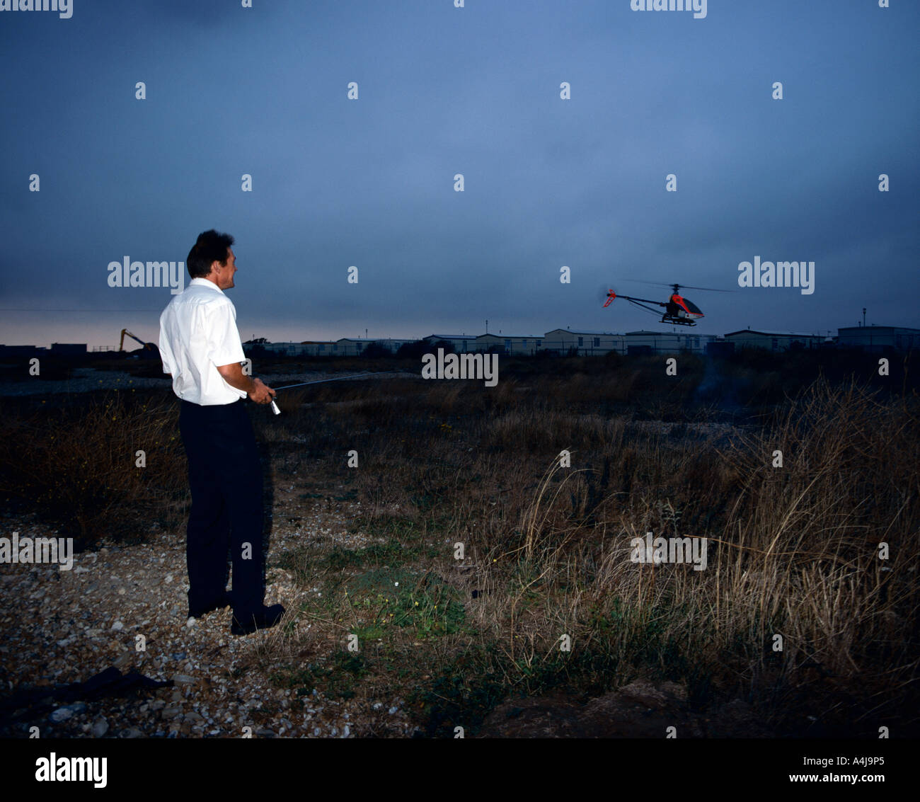 Remote control helicopter pilot Stock Photo - Alamy