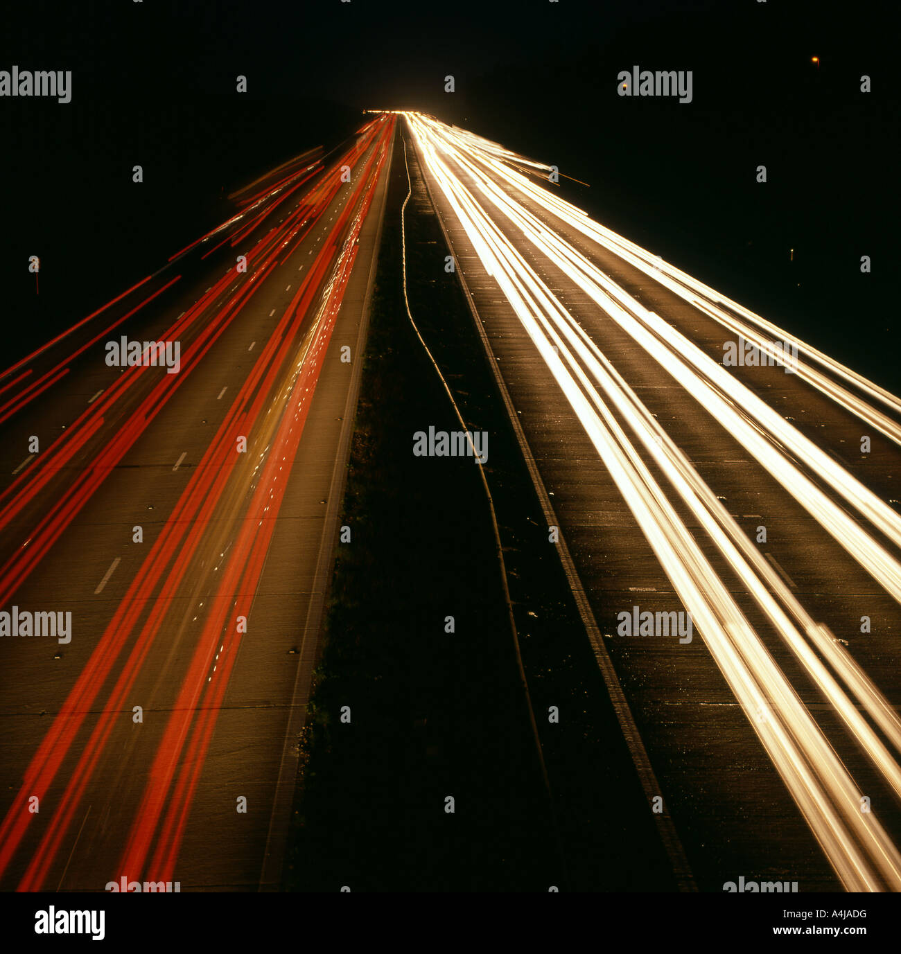 M25 Motorway at night Reigate in Surrey England Streaks of lights from ...
