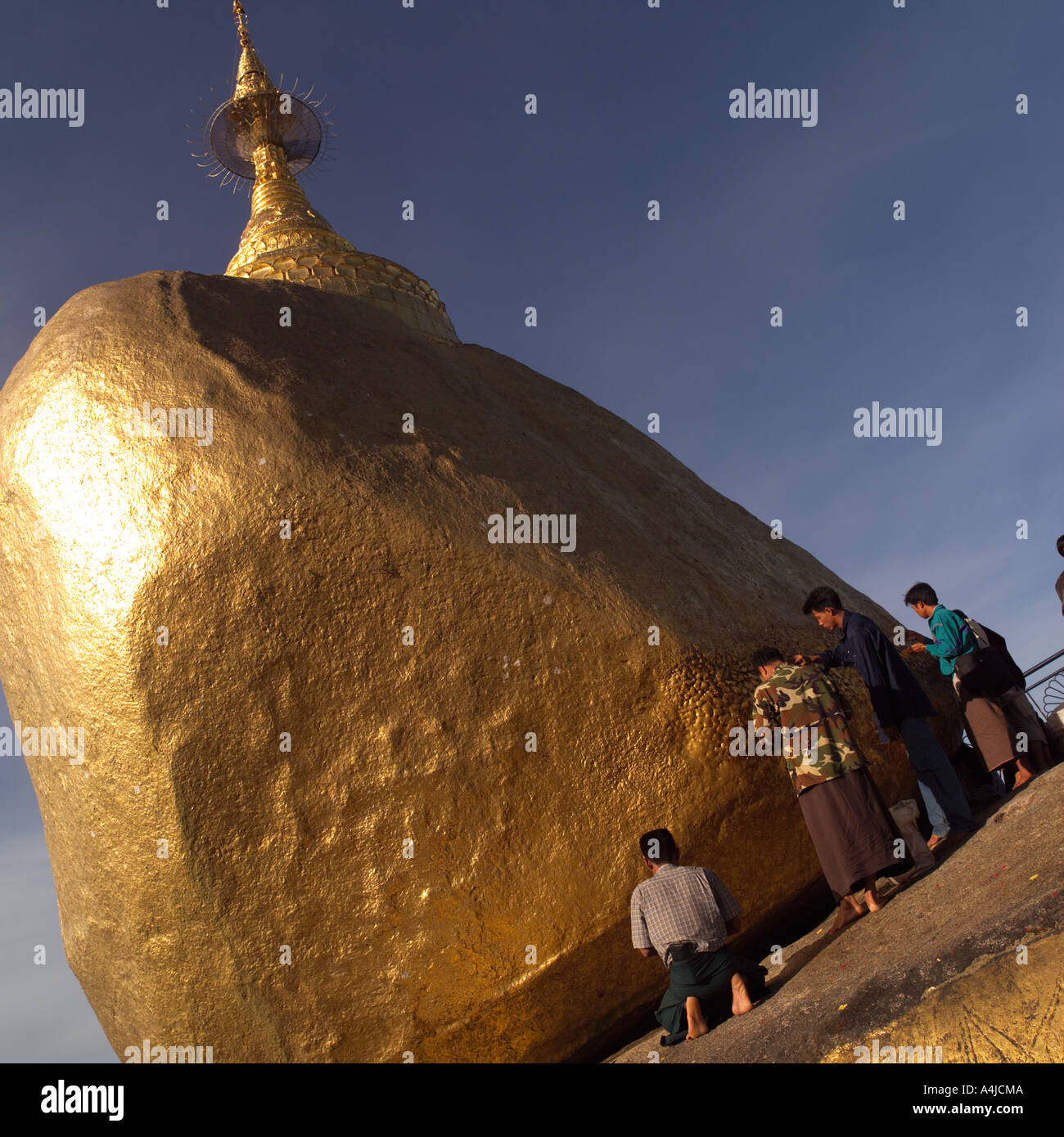 Pilgrims at gold rock shrine hi-res stock photography and images - Alamy