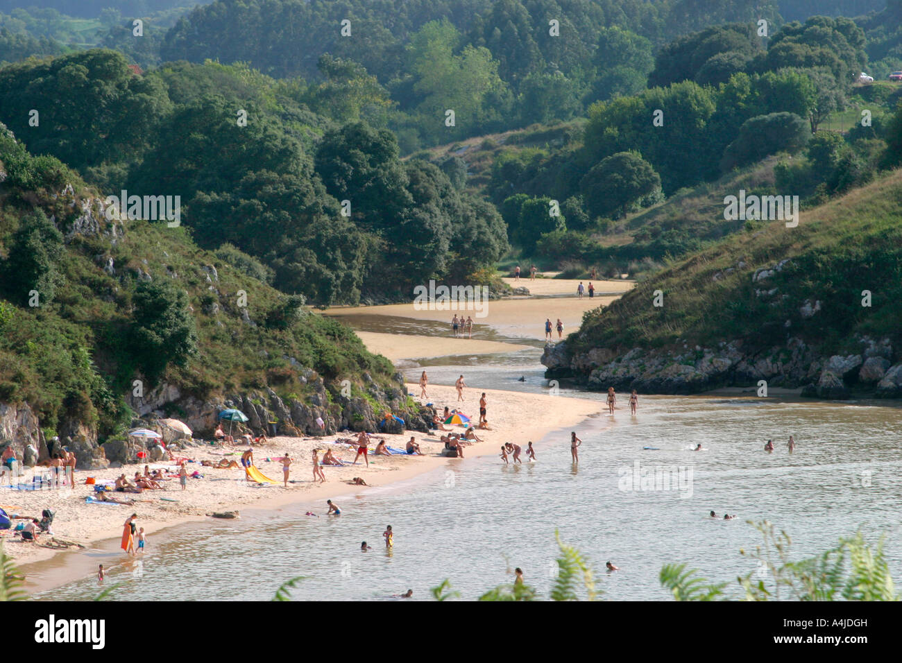 Pretty Green Poo Beach in Asturias, Northern Spain Stock Photo - Alamy