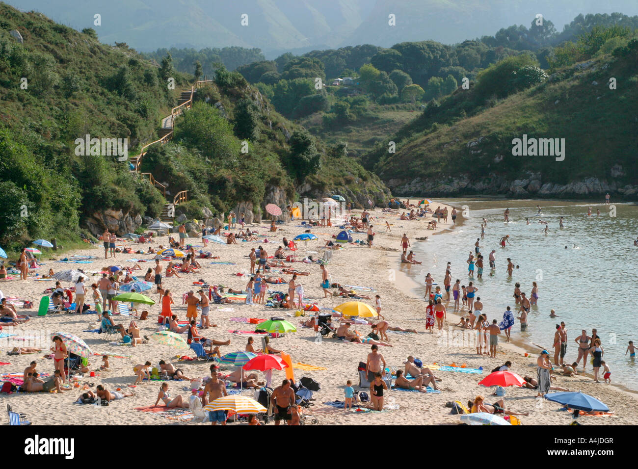 Pretty Green Poo Beach in Asturias, Northern Spain Stock Photo - Alamy