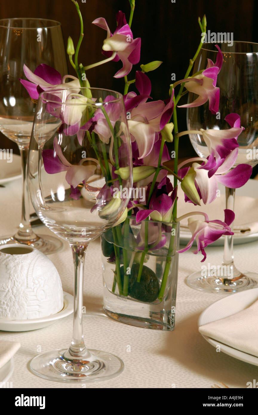 Table setting with Orchids Stock Photo - Alamy