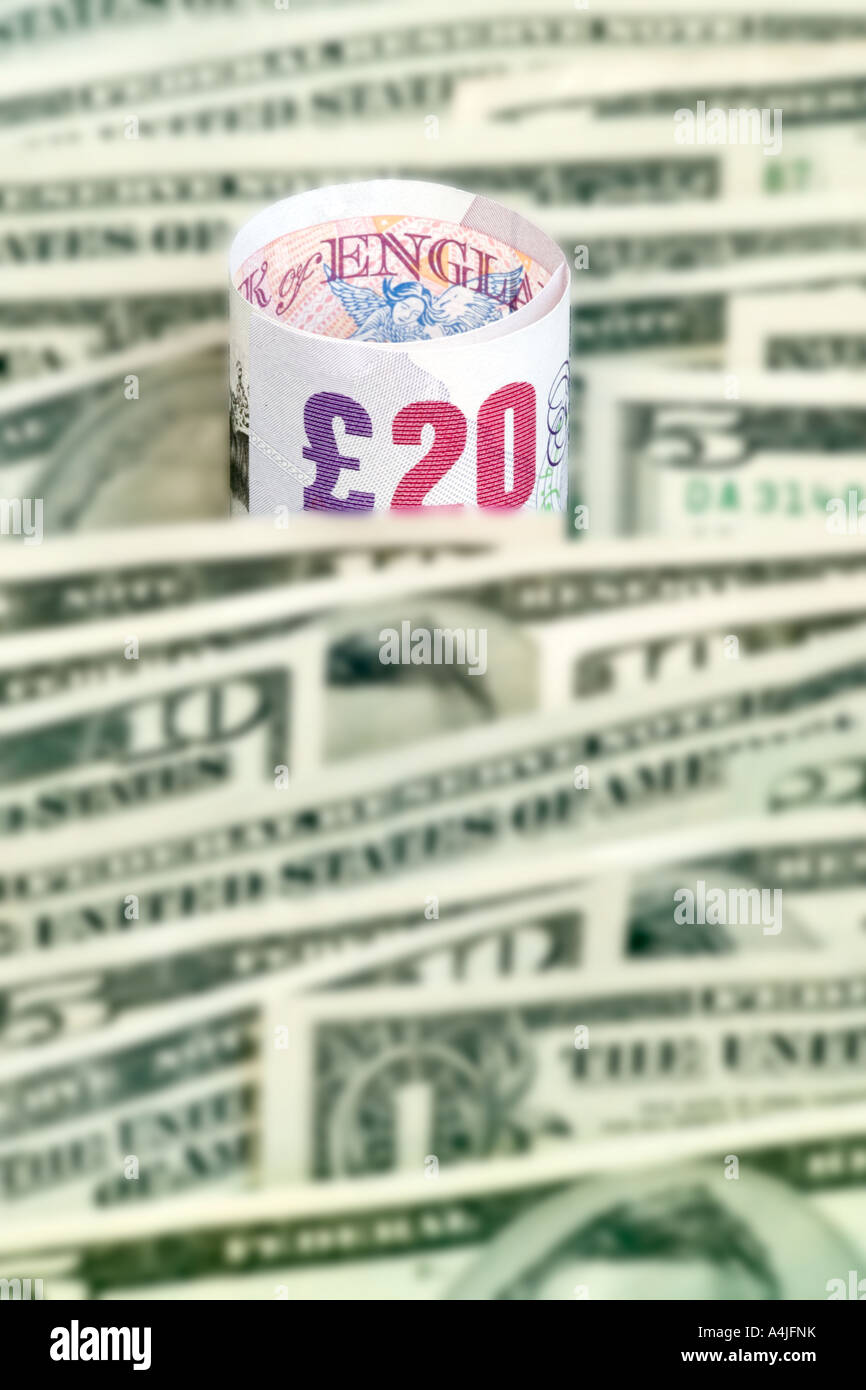 twenty pound note rising up from US 1 5 10 20 50 dollar bills Stock ...