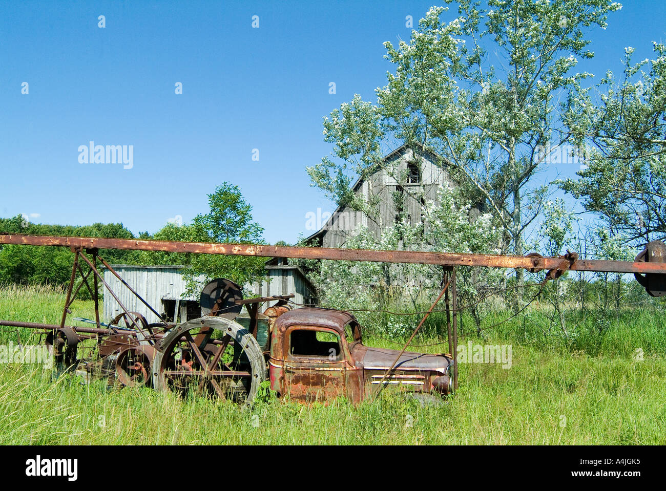 Barn and disused farming equipment, Manitoulin Island, Ontario, Canada ...