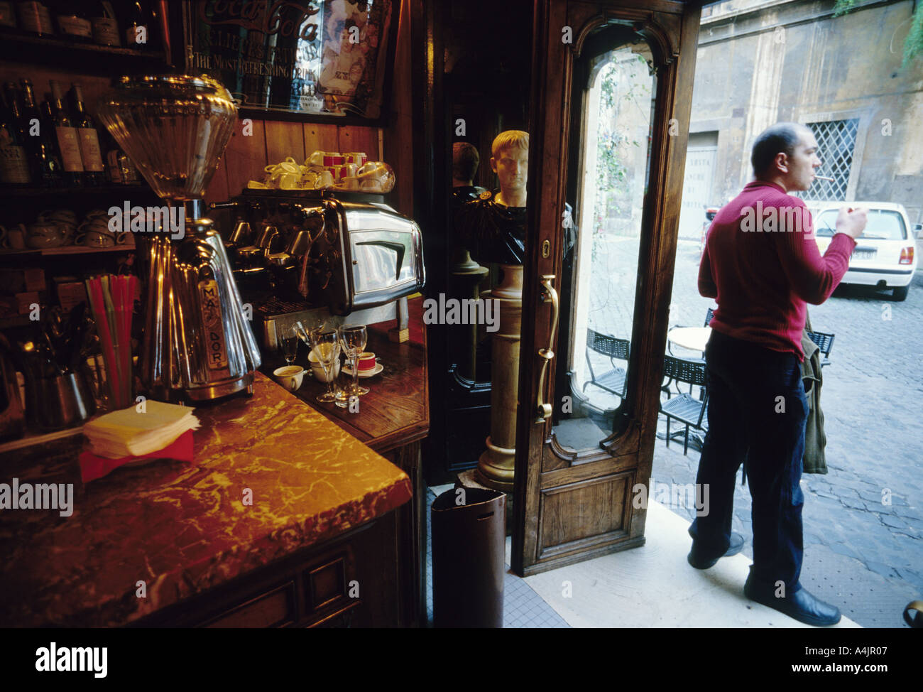 Rome. Italy. Man smoking, Antico Caffe della Pace aka Bar della Pace ...