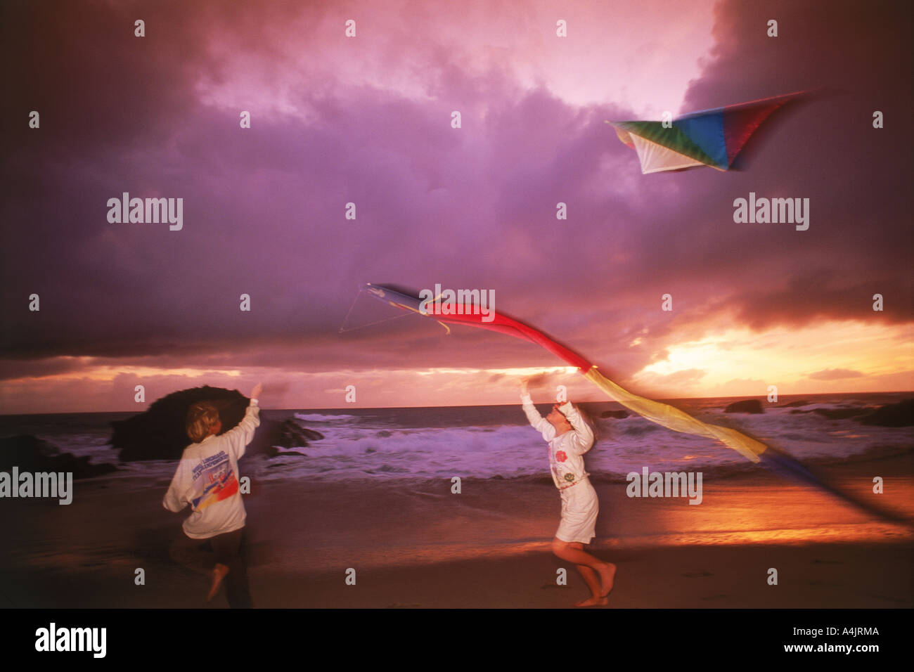 Children windy hi-res stock photography and images - Alamy