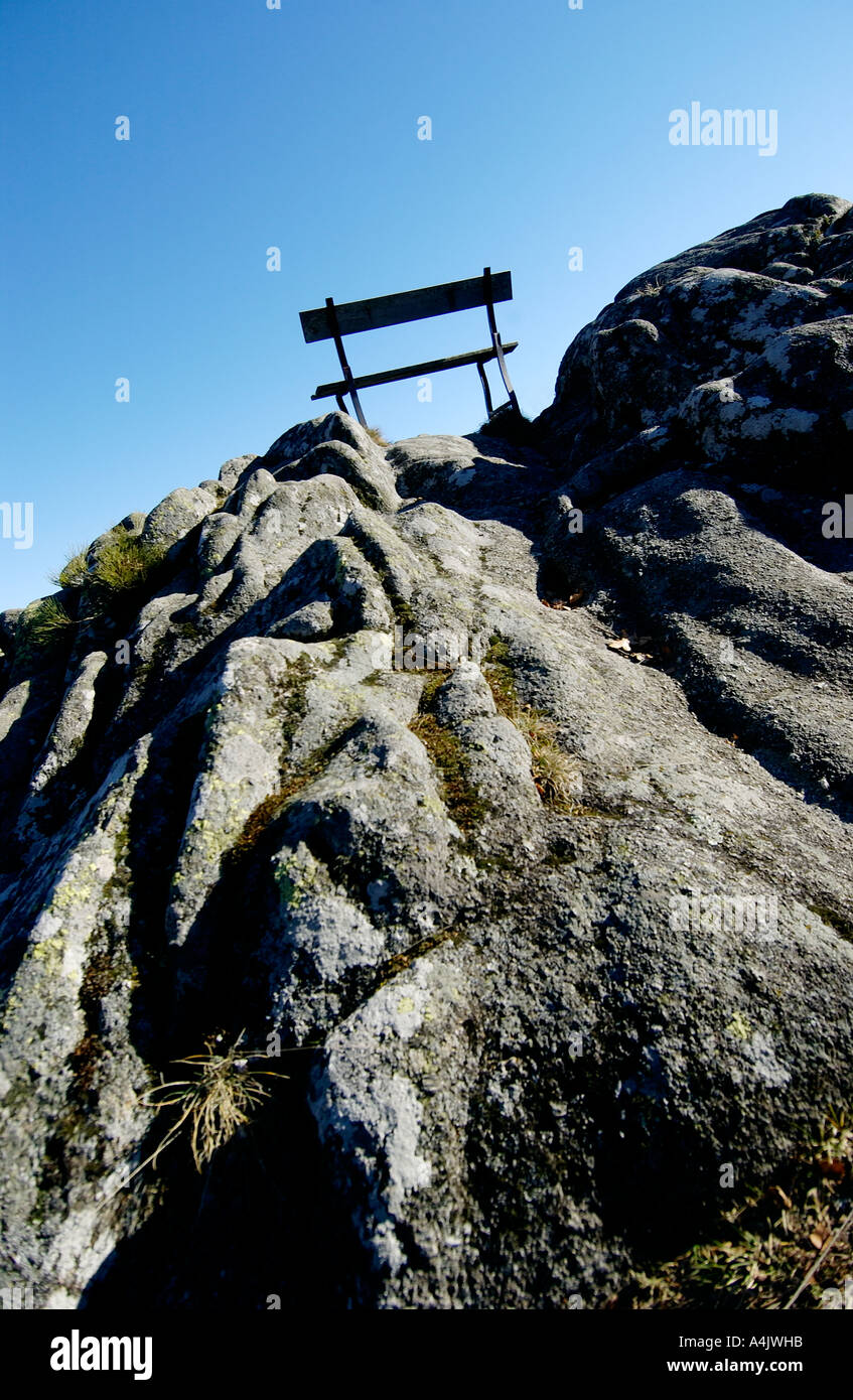 Bench isolated in the top of rocks Stock Photo - Alamy