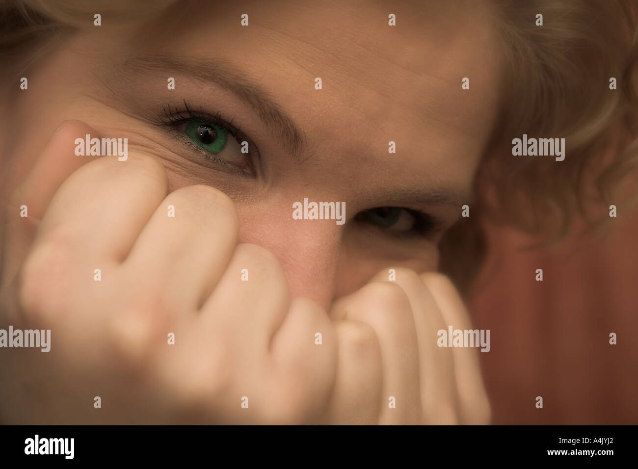 Scared girl hiding face hi-res stock photography and images - Alamy
